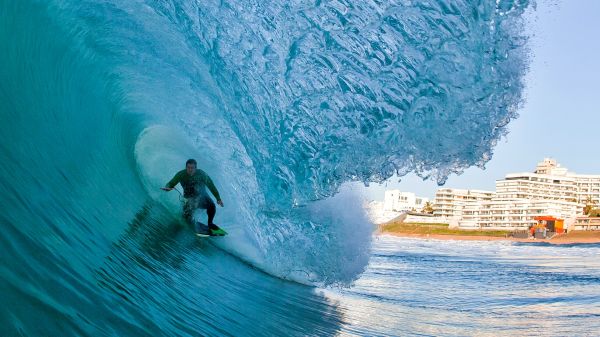 Keith Rowe-Wilson, dropknee backhand tube/barrel at Ballito. Chris Van ...